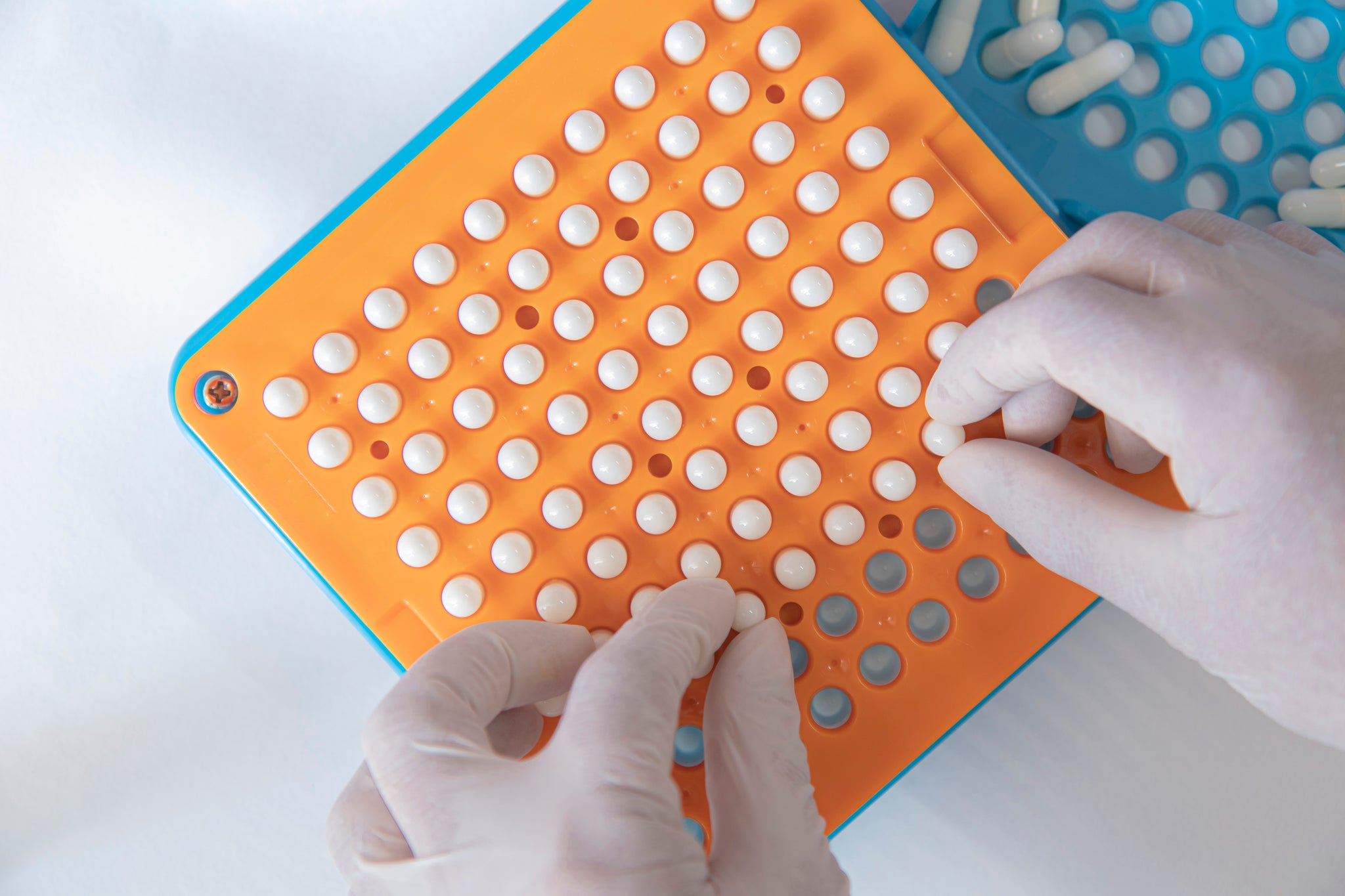 100-Hole Manual Capsule Filler (Sizes 000–5), The P Series.